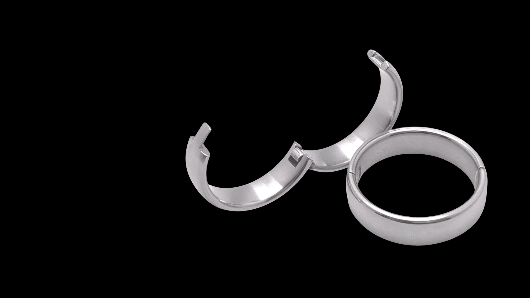 Hinged rings go on easily around swollen knuckles to fit your finger ...